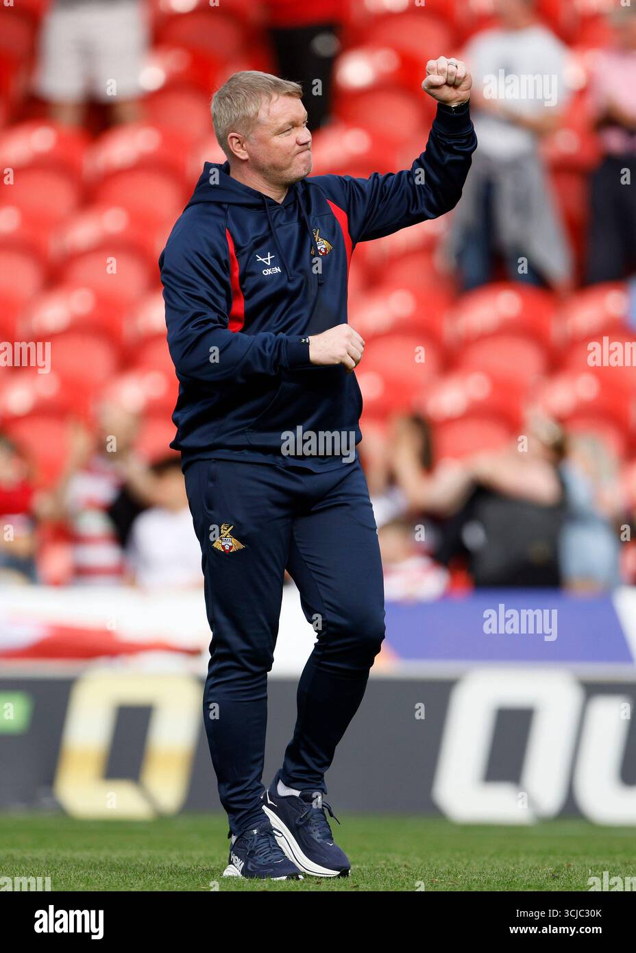 Doncaster Rovers manager Grant McCann celebrates after the Sky Bet ...