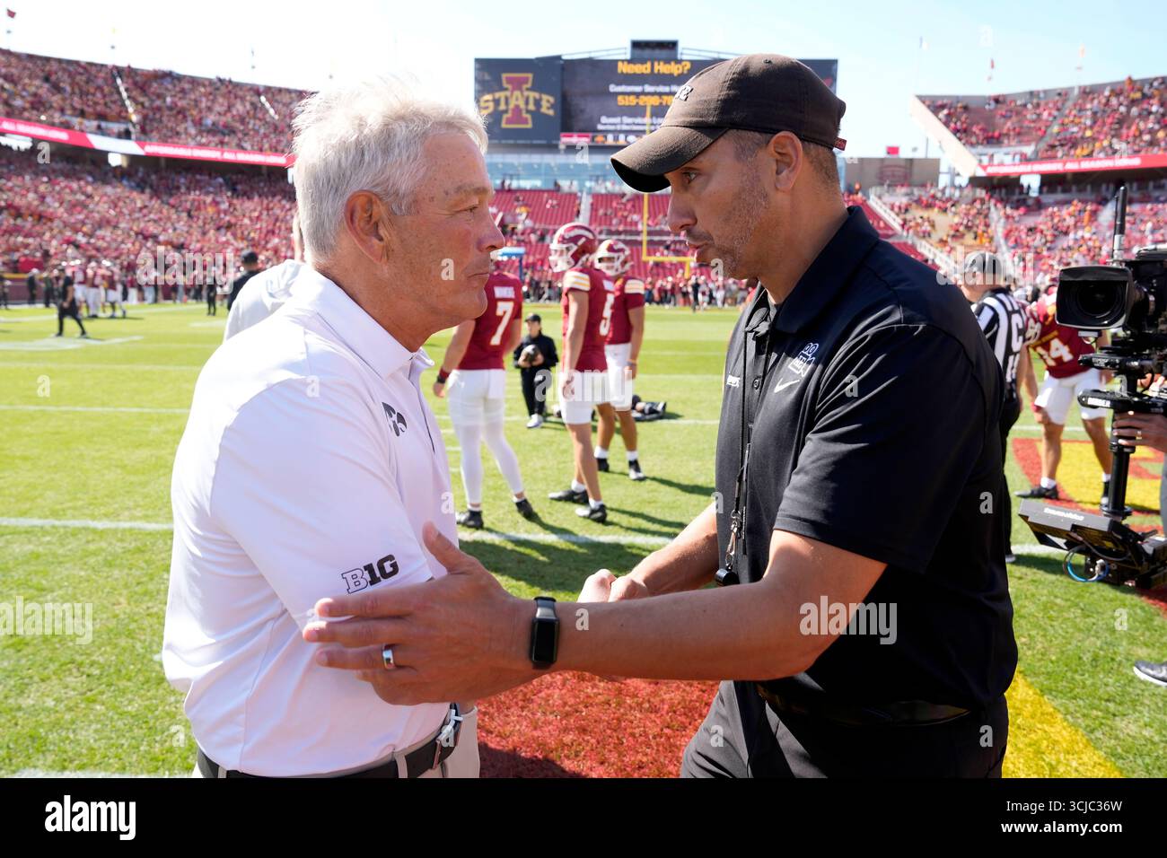 Iowa head coach Kirk Ferentz, left, talks with Iowa State head coach ...