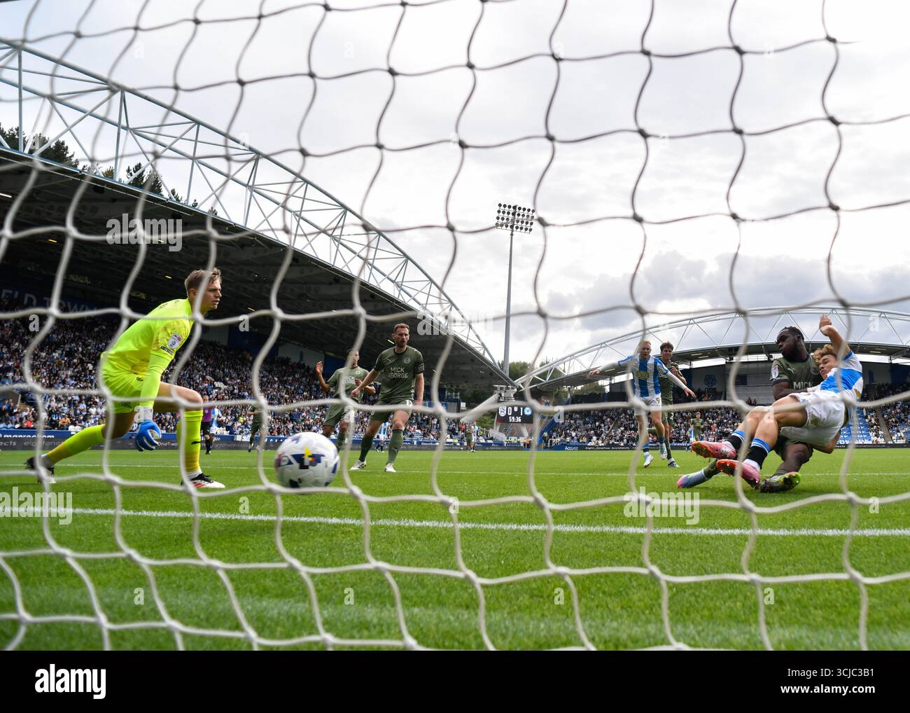 Huddersfield Town's Will Alves scores his sides first goal during the ...
