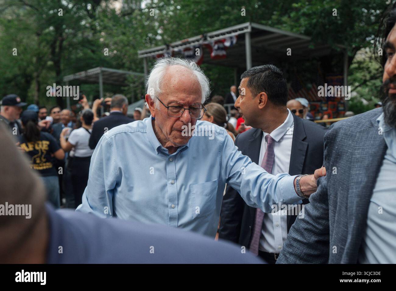 Sen. Bernie Sanders, I-Vt., leaves with members of security detail ...
