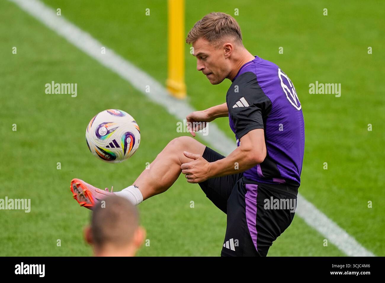 Germany's Joshua Kimmich exercises during a training session at the ...