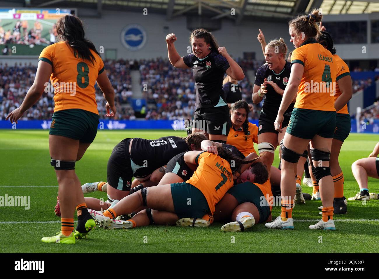 England’s Amy Cokayne (obscured) scores their side’s second try of the ...