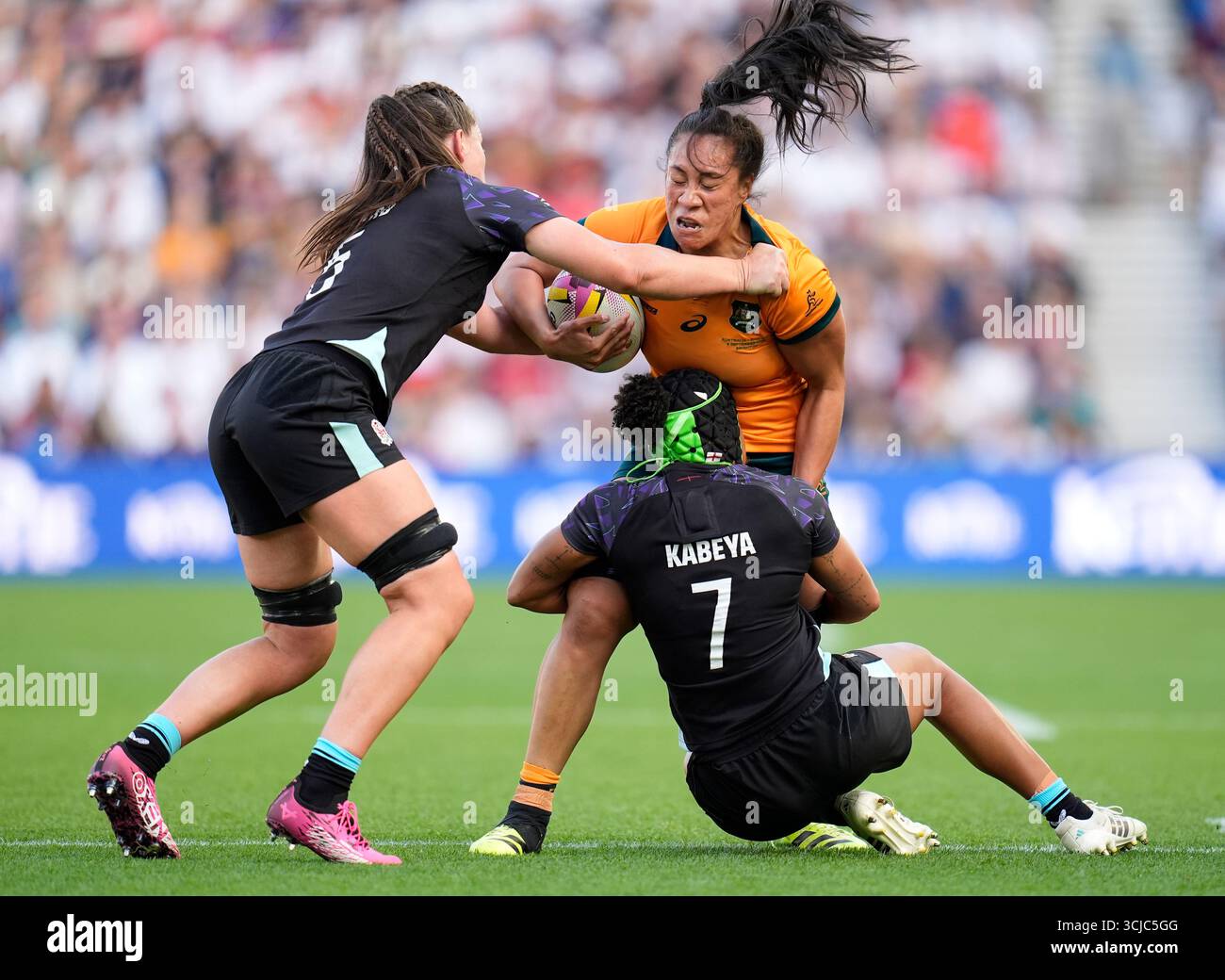 Australia's Siokapesi Palu is tackled by England's Morwenna Talling ...