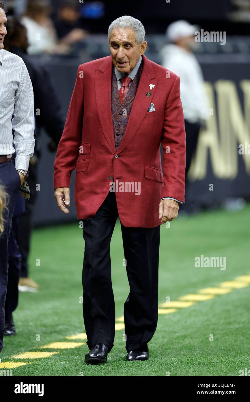 Atlanta Falcons owner Arthur Blank walks on the field before an NFL ...