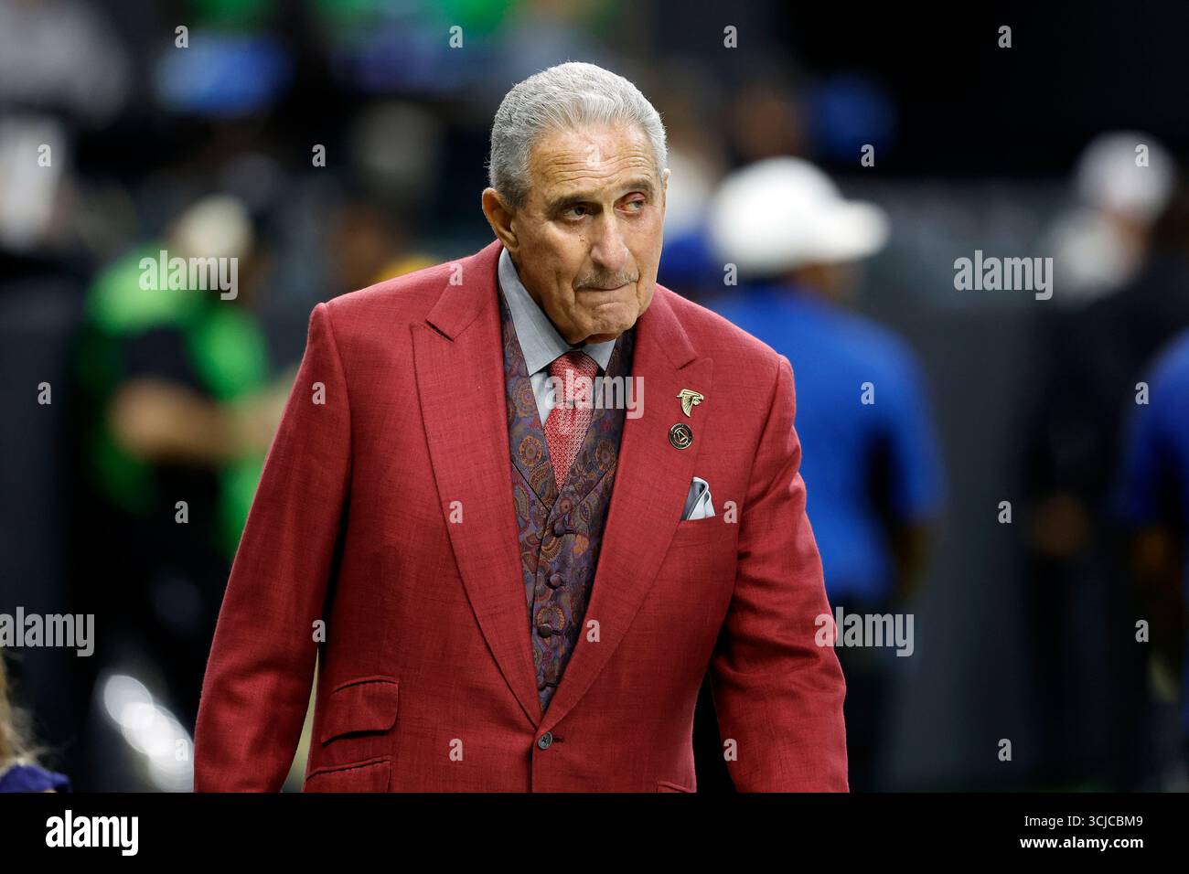 Atlanta Falcons owner Arthur Blank walks on the field before an NFL ...
