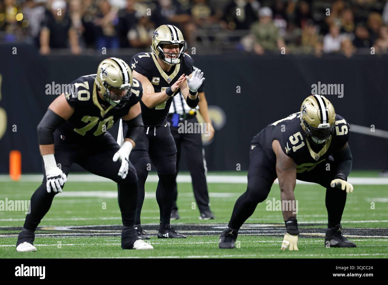 New Orleans Saints tight end Taysom Hill (7) calls a play during an NFL ...