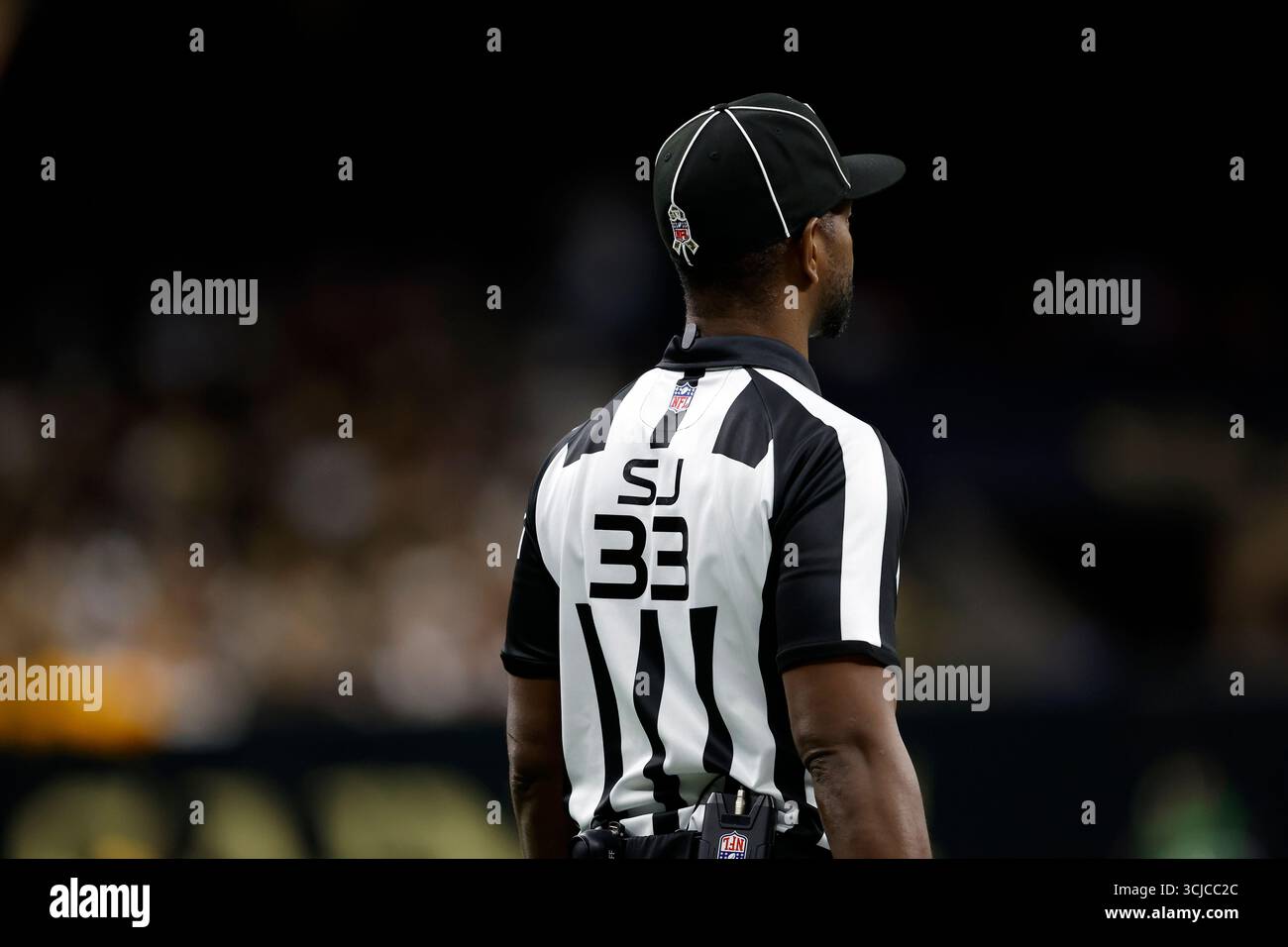 Umpire Tra Blake (33) works during an NFL football game between the New ...