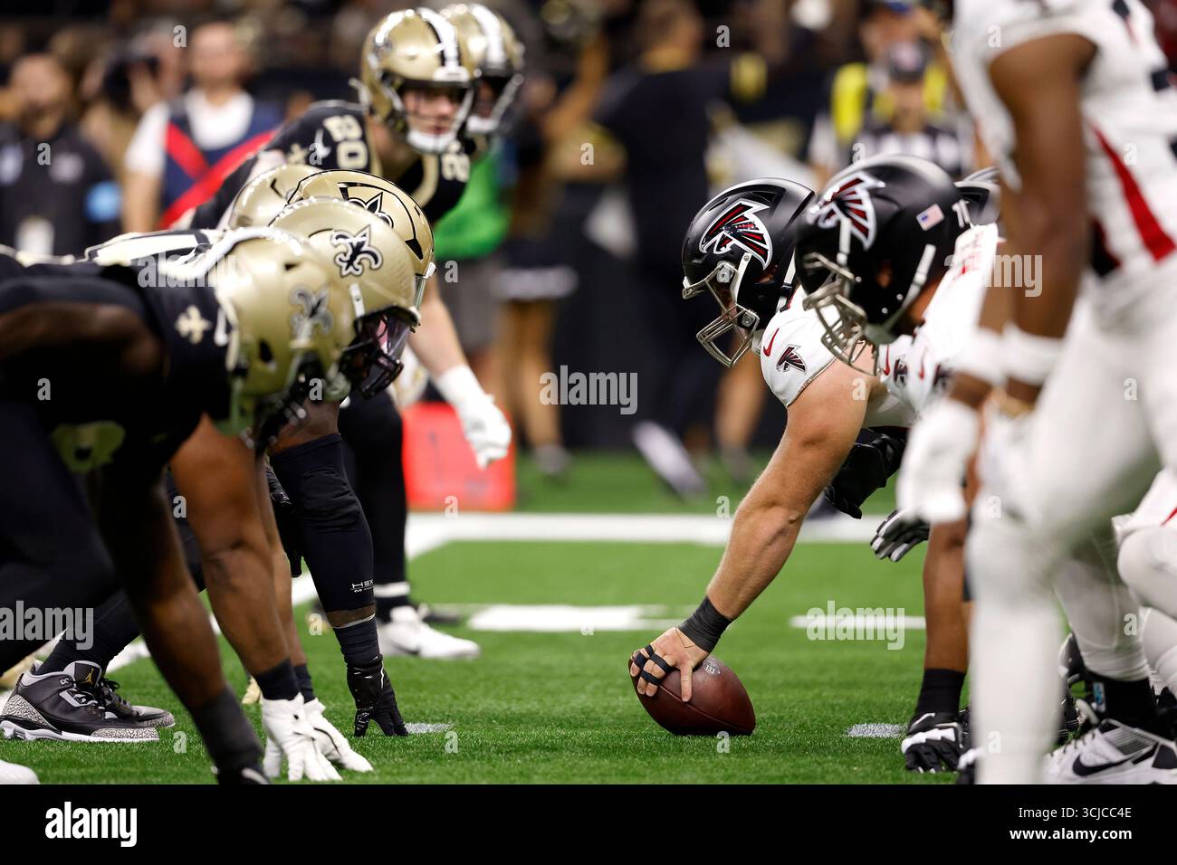The Atlanta Falcons offense lines up against the New Orleans Saints ...