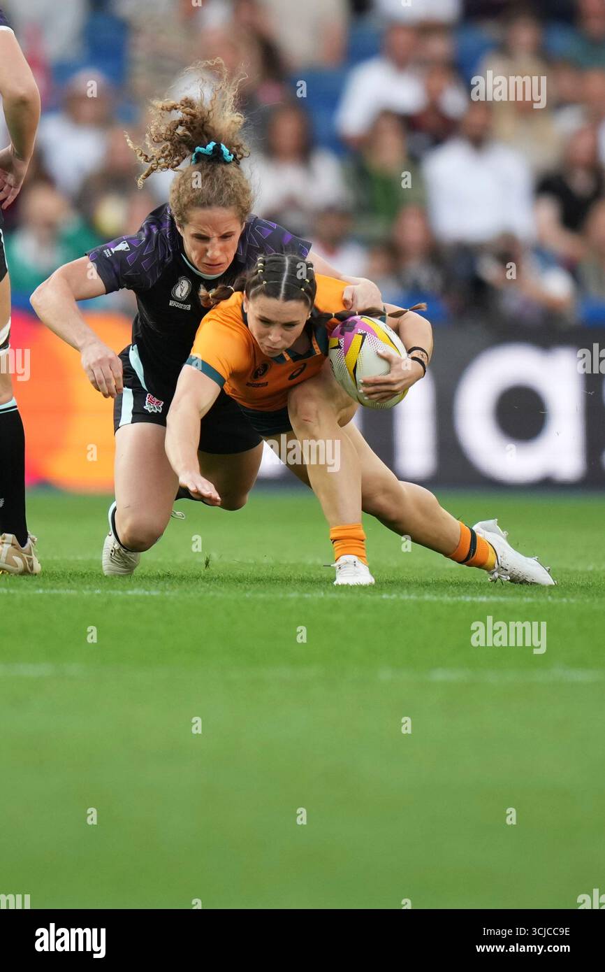Australia's Desiree Miller, right, and England's Abby Dow challenge for ...
