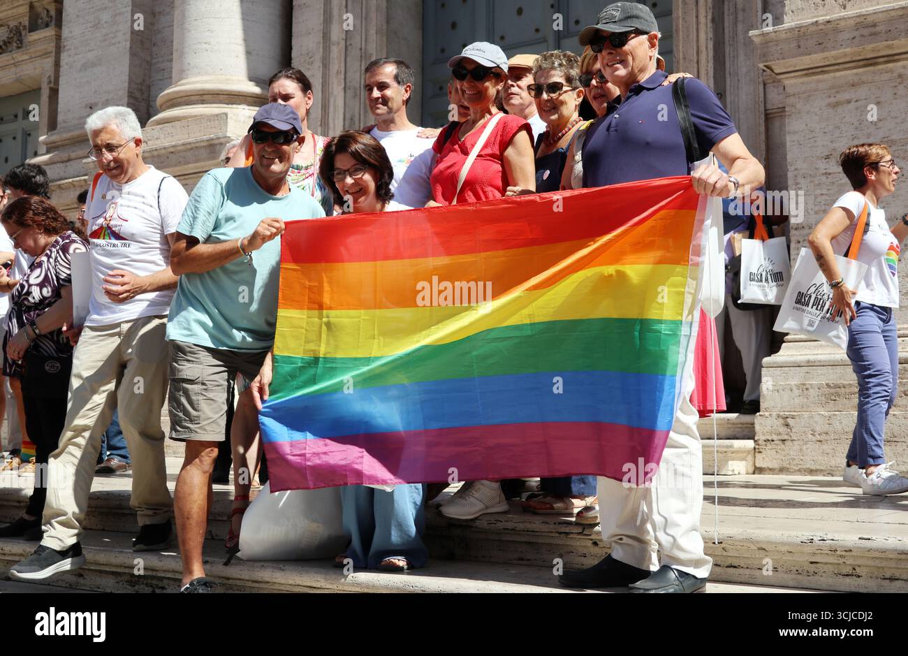Hundreds of LGBTQ Catholics gather outside chiesa del Gesù church after ...