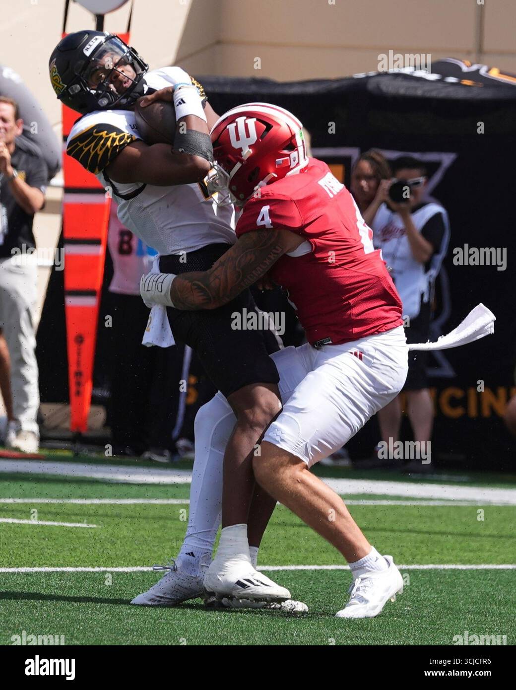 Kennesaw State quarterback Amari Odom (2) is tackled by Indiana ...
