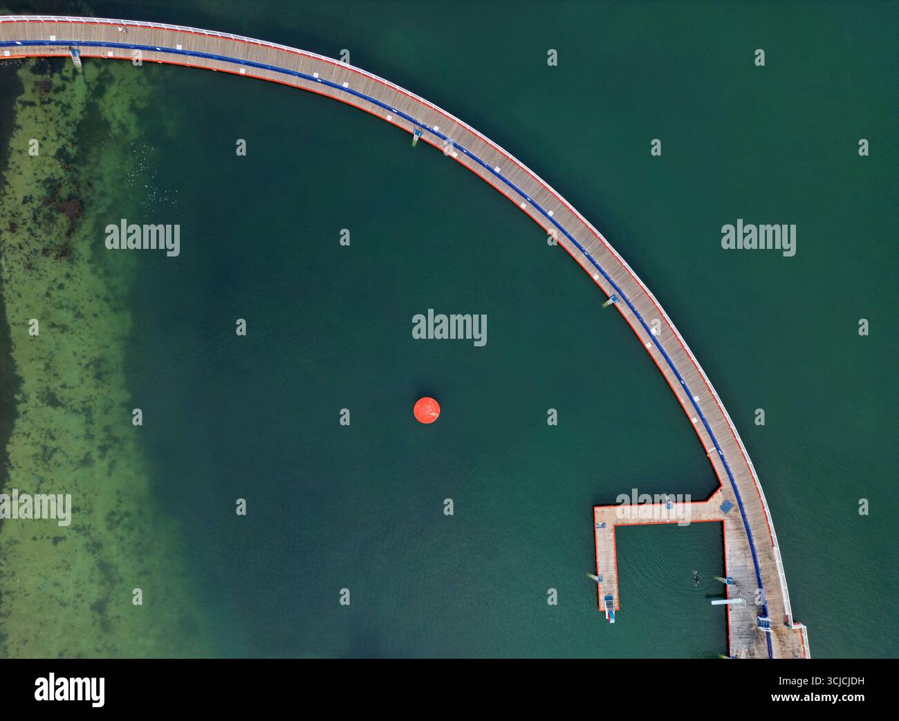 Aerial top view of the Geelong waterfront showcasing a curved pier ...