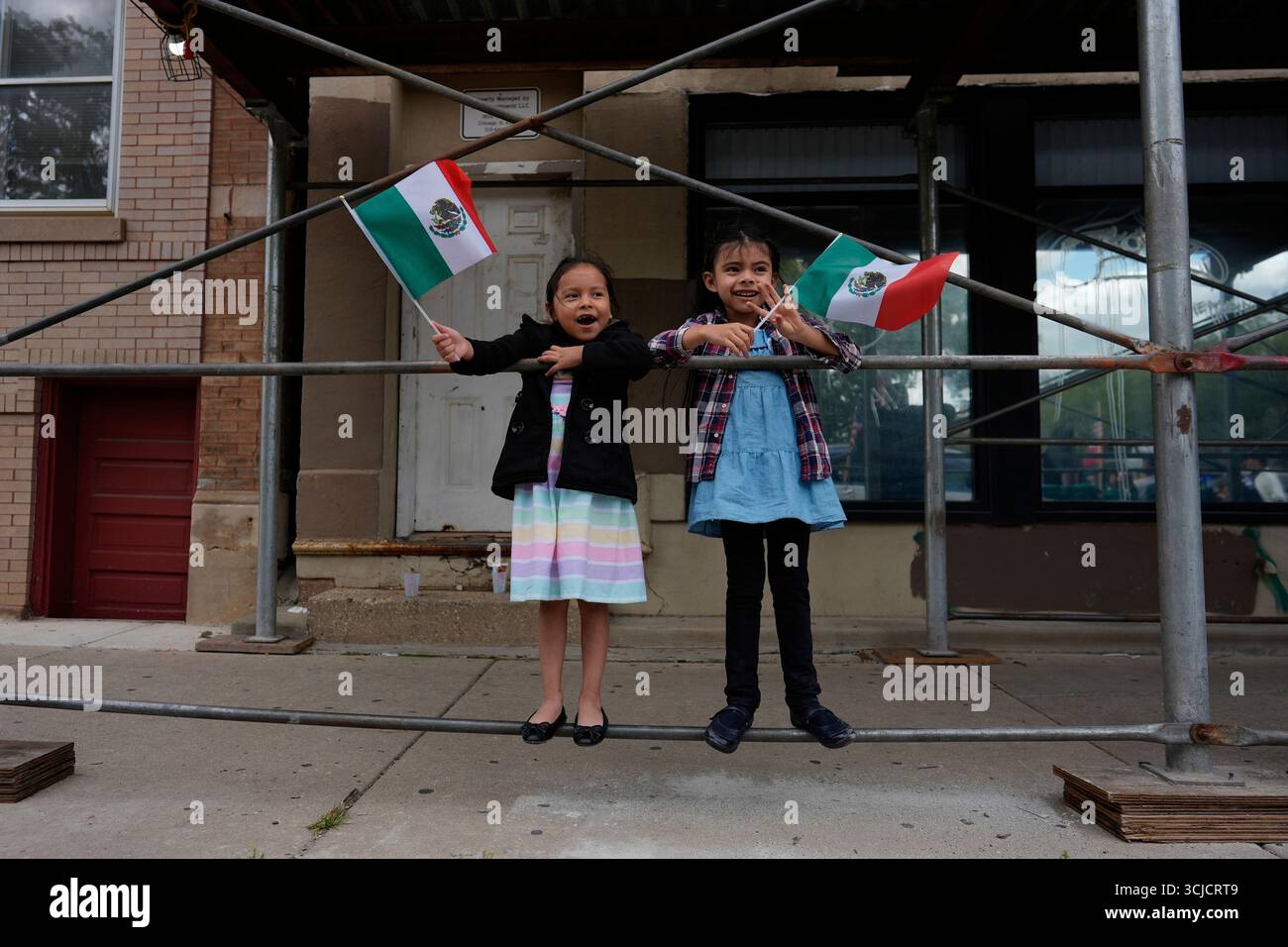 Melanie Valentin, left, and Emily Sarmina watch during the 2025 Pilsen ...
