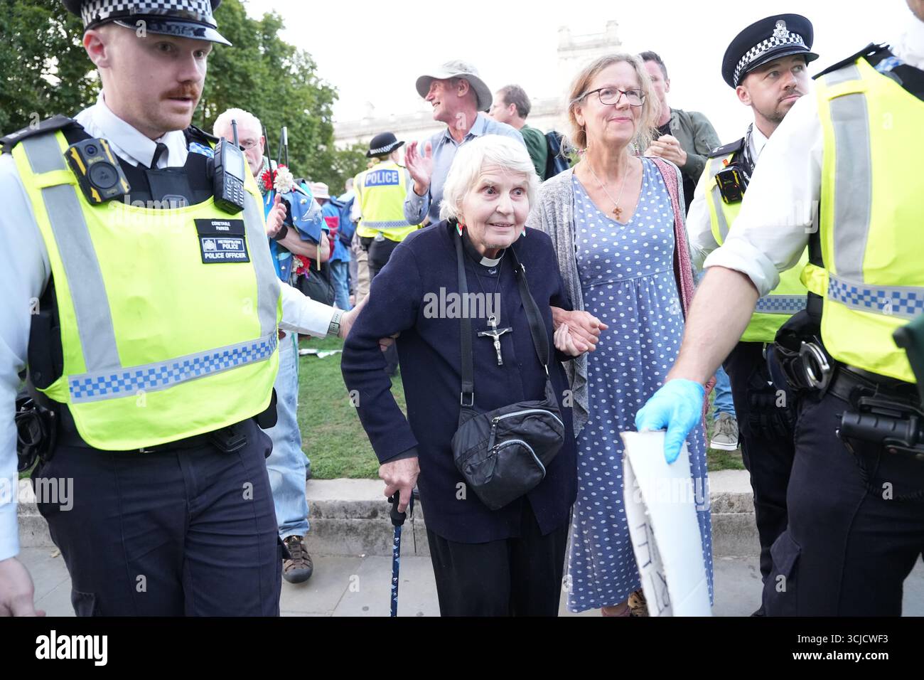 Police officers remove a protester as demonstrators take part in a Lift ...