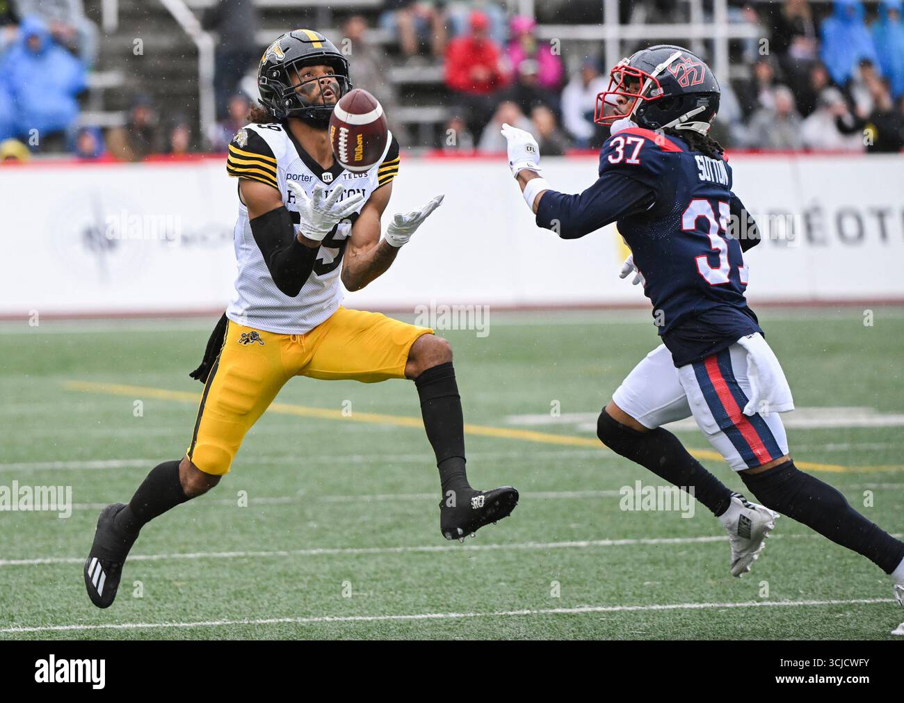 Hamilton Tiger-Cats' Kenny Lawler (89) makes a catch as Montreal ...