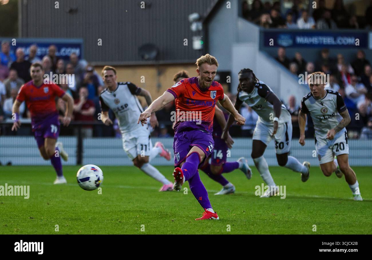 Gillingham's Max Clark scores their side's second goal of the game from ...
