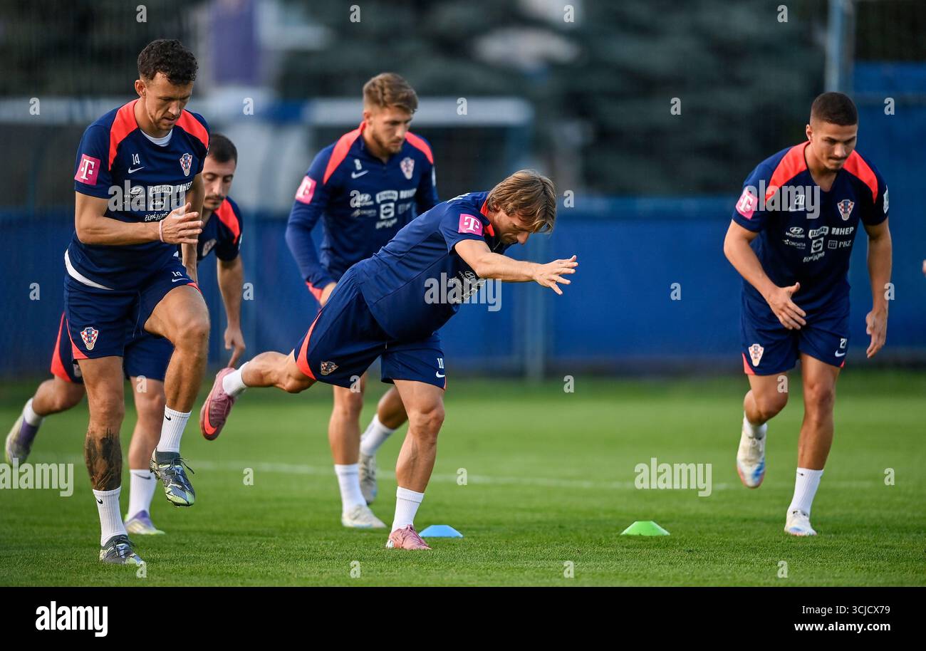 Ivan Perisic, Luka Modric and Franjo Ivanovic of Croatia during the training session at Maksimir ...