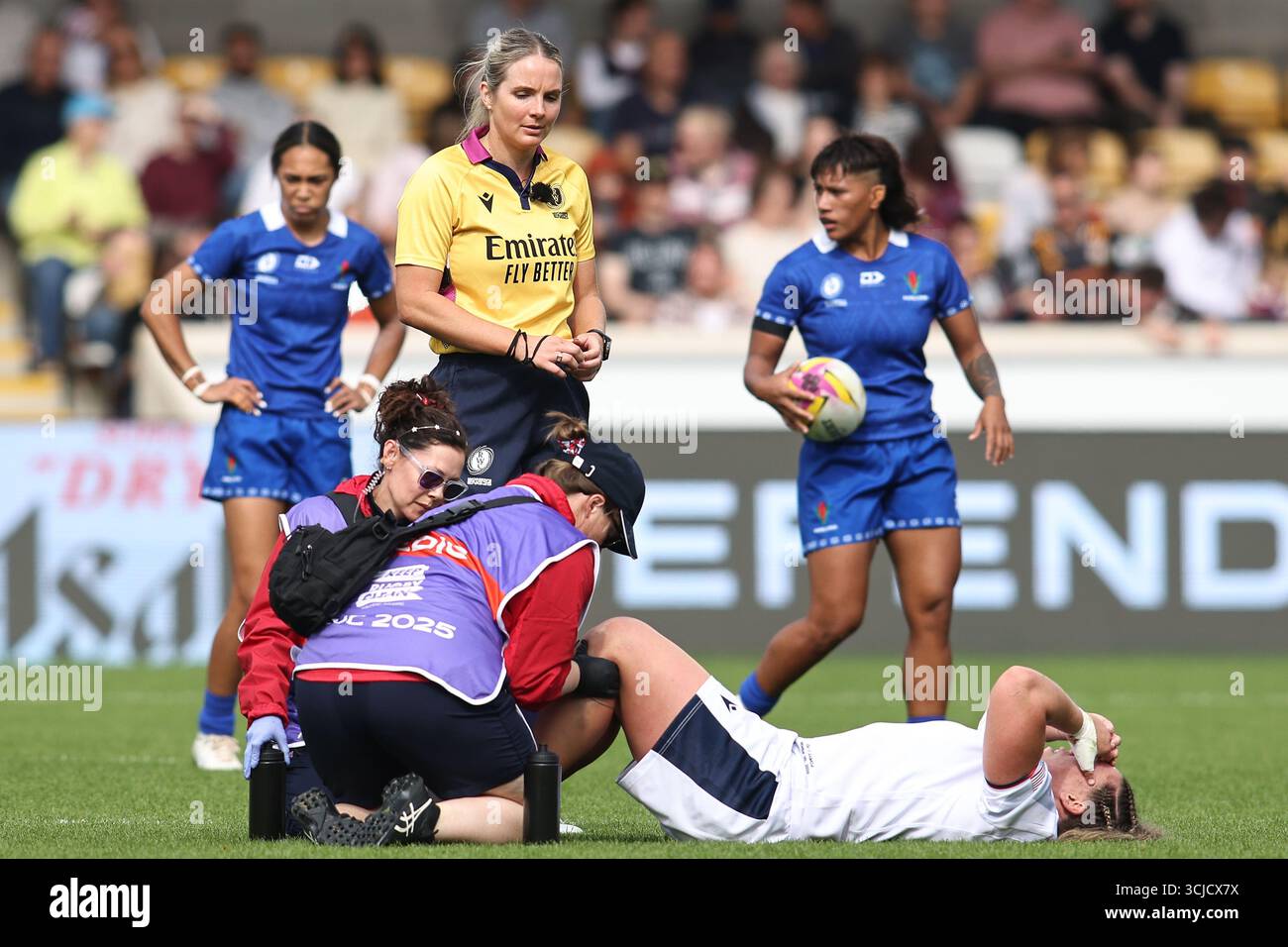 Hope Rodgers receives treatment while Referee Natarsha Ganley watches ...