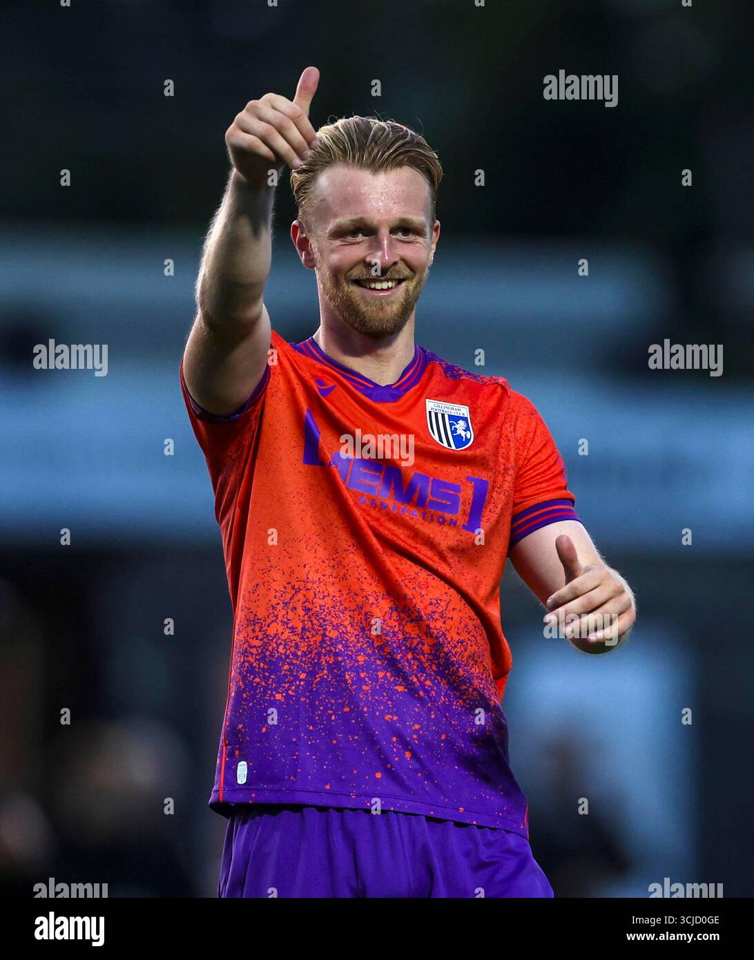 Gillingham's Max Clark celebrating with the fans after the final ...