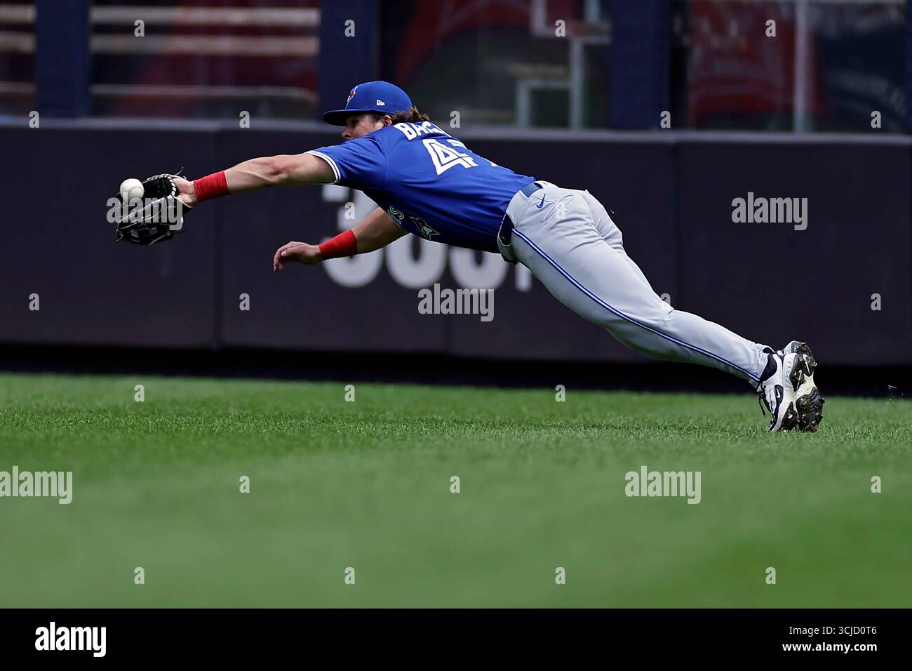 Toronto Blue Jays right fielder Addison Barger (47) makes a diving ...