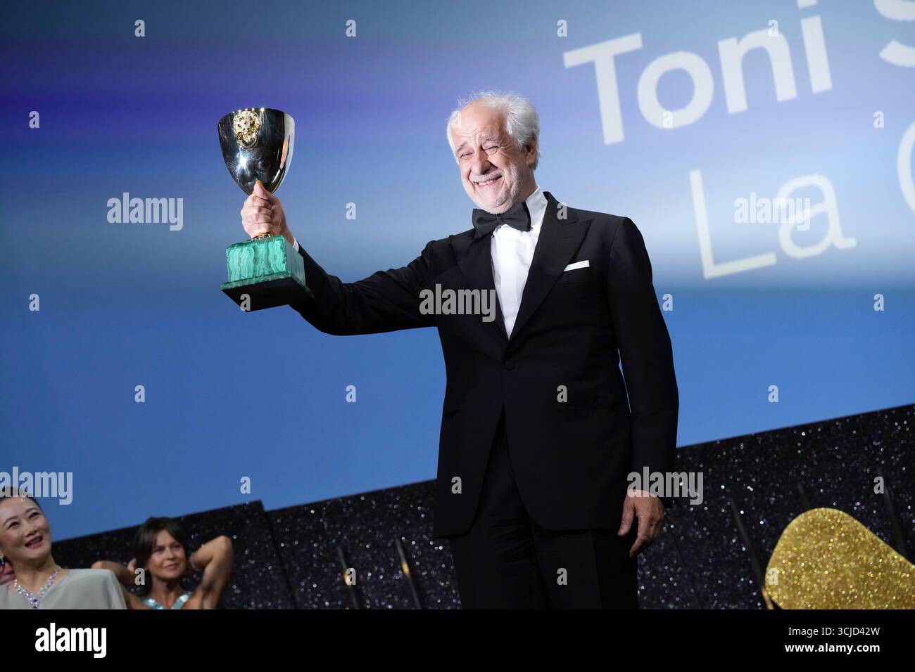 Toni Servillo accepts the Coppa Volpi award for best actor for 'La ...