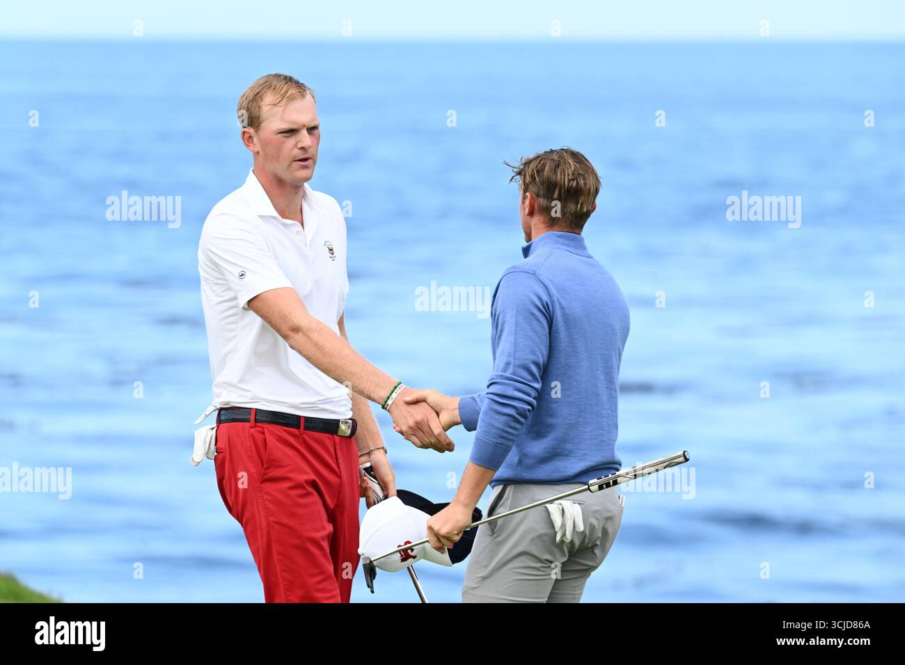 The USA team's Tommy Morrison shakes hands with The Great Britain and ...