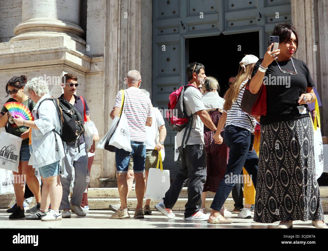 Hundreds of LGBTQ Catholics gather outside chiesa del Gesù church after ...