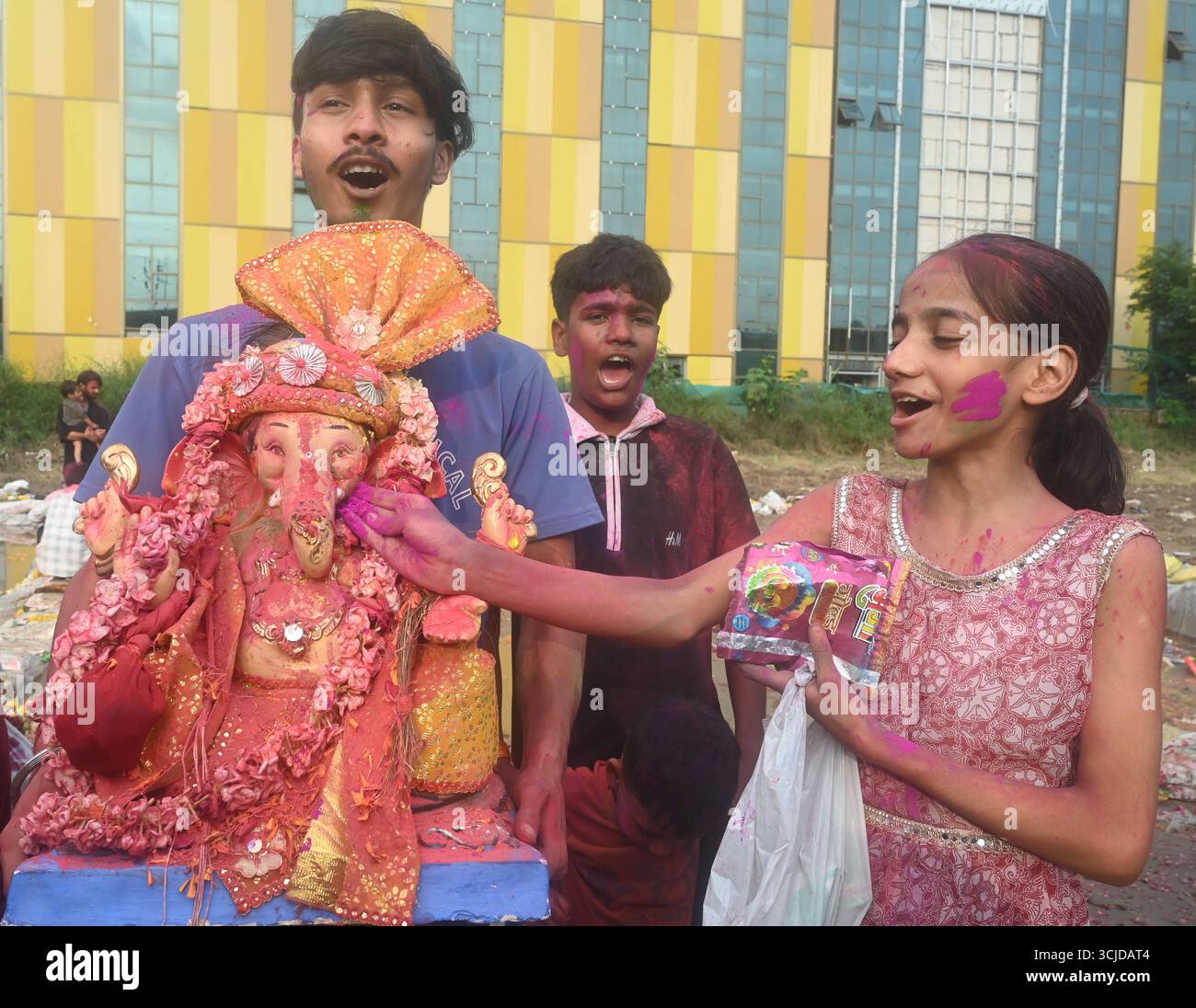 NEW DELHI, INDIA - SEPTEMBER 6: Devotees immersed the idol of Shree ...