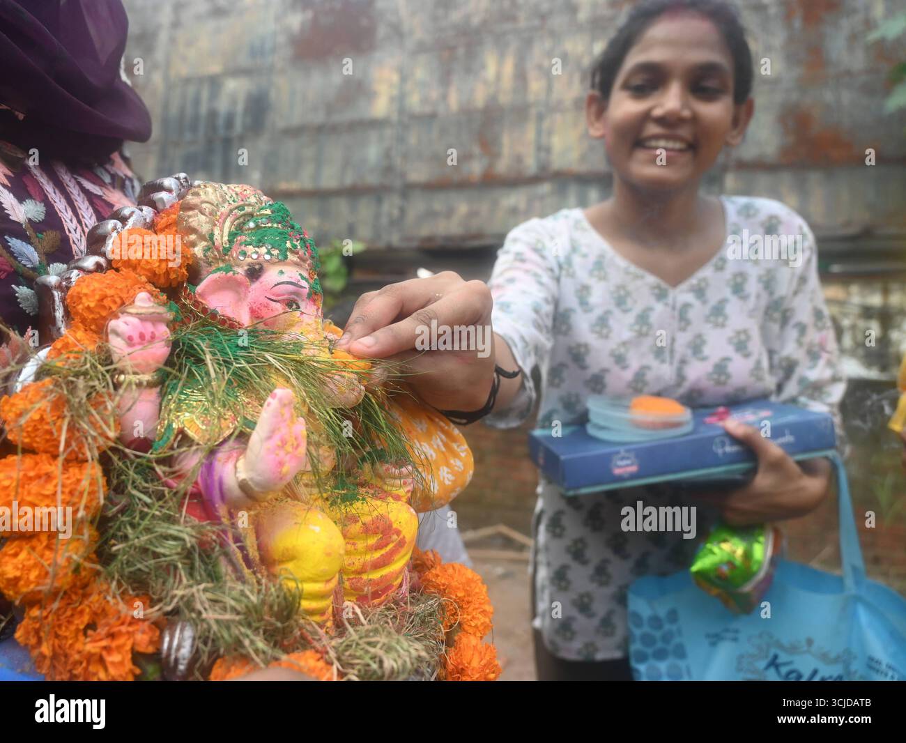 NEW DELHI, INDIA - SEPTEMBER 6: Devotees immersed the idol of Shree ...
