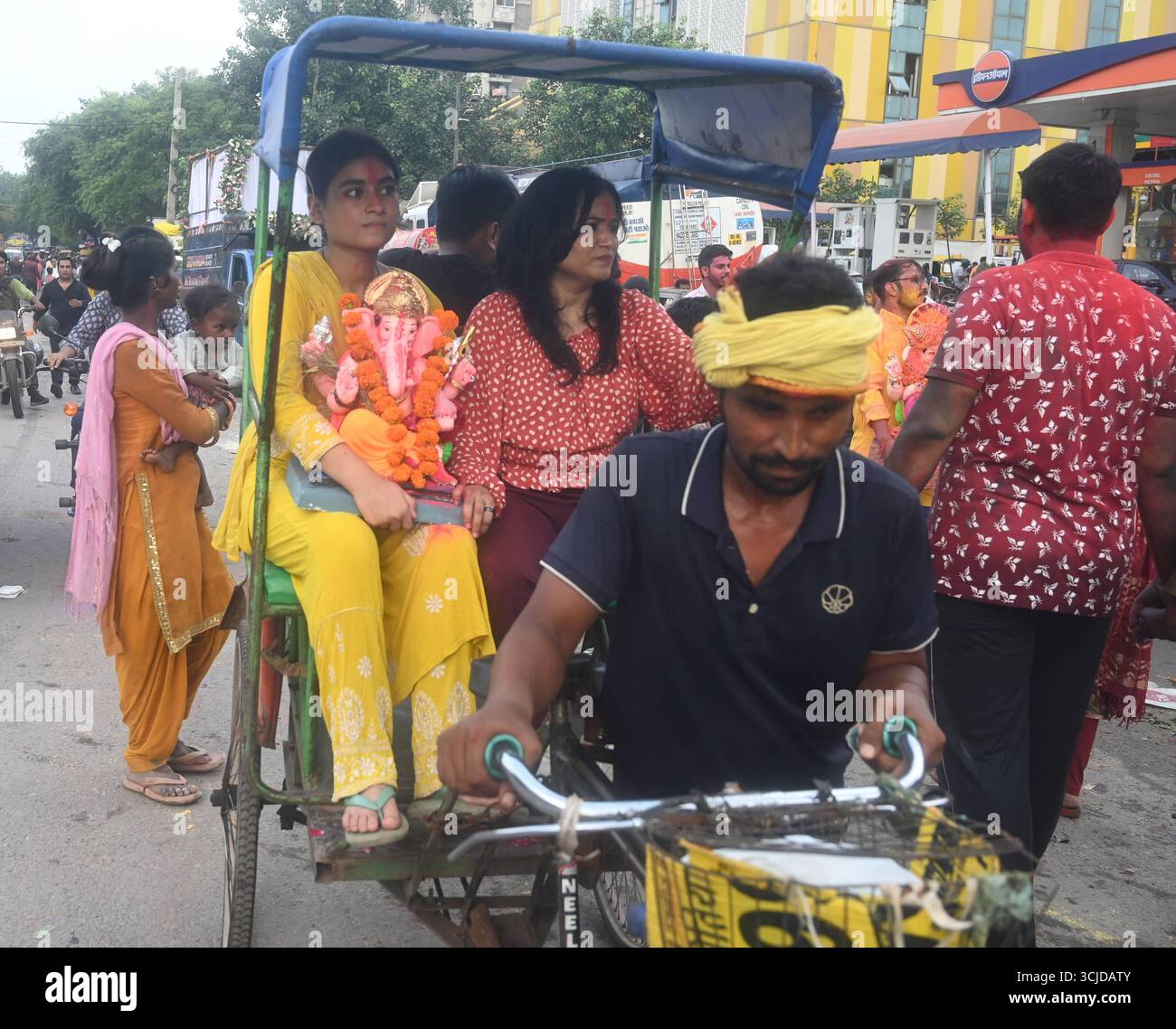 NEW DELHI, INDIA - SEPTEMBER 6: Devotees immersed the idol of Shree ...