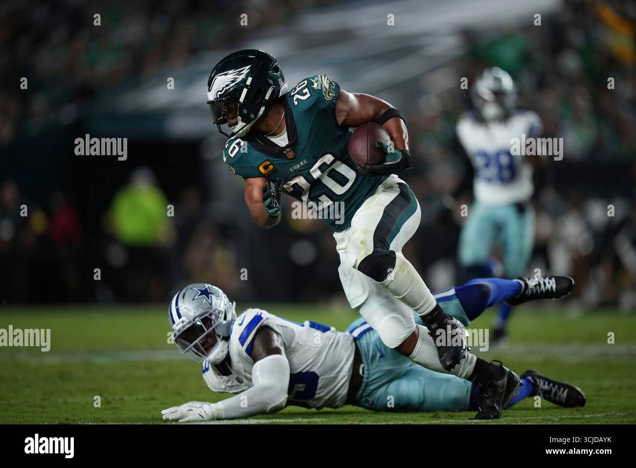Philadelphia Eagles' Saquon Barkley, right, plays against Dallas ...