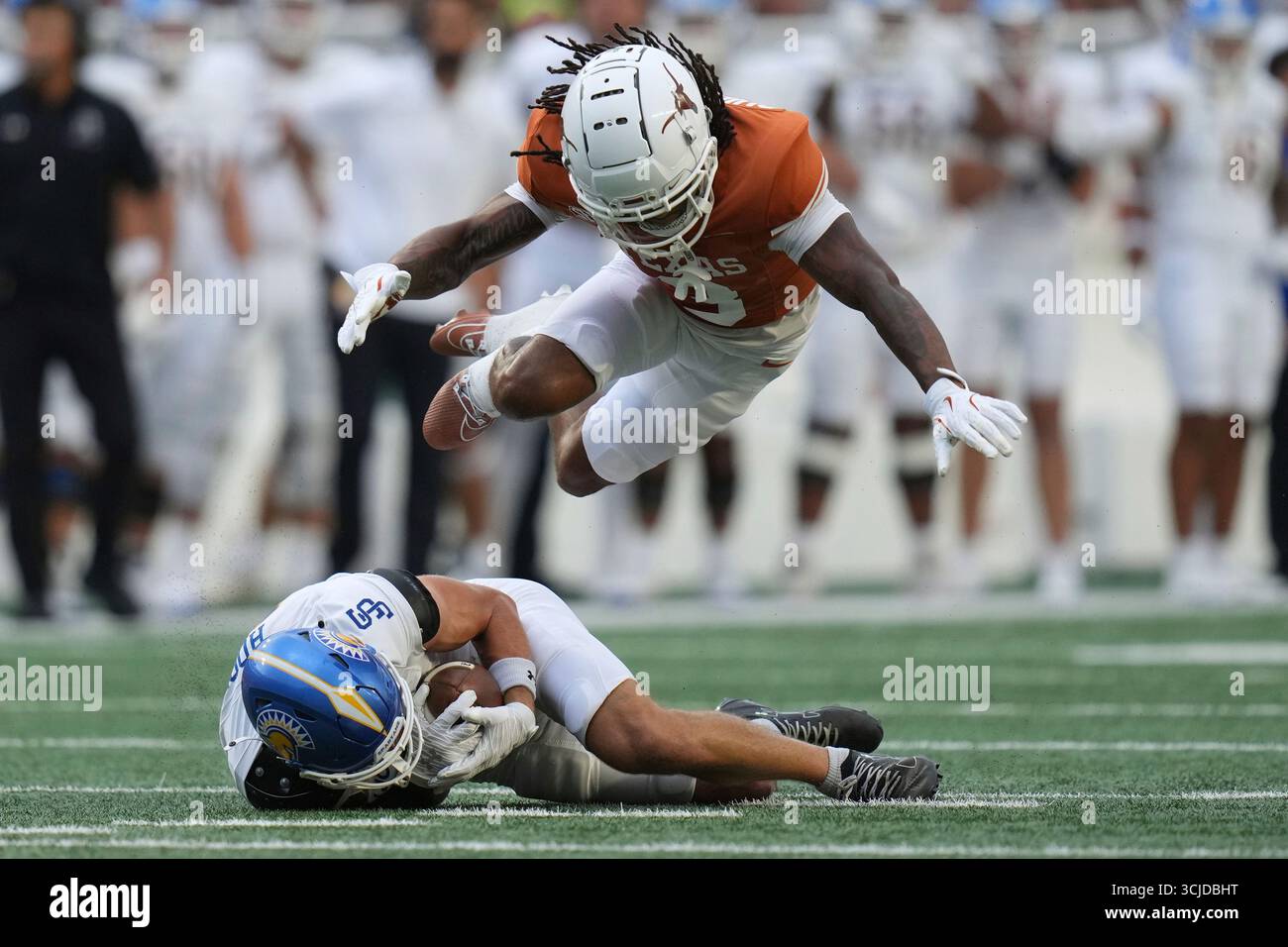 San Jose State wide receiver Cooper Hoch (13) makes a catch under Texas ...