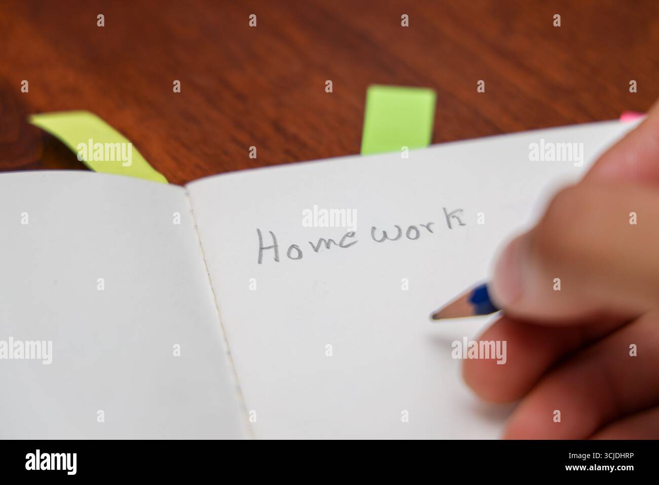 Woman hand writing back school hi-res stock photography and images - Alamy