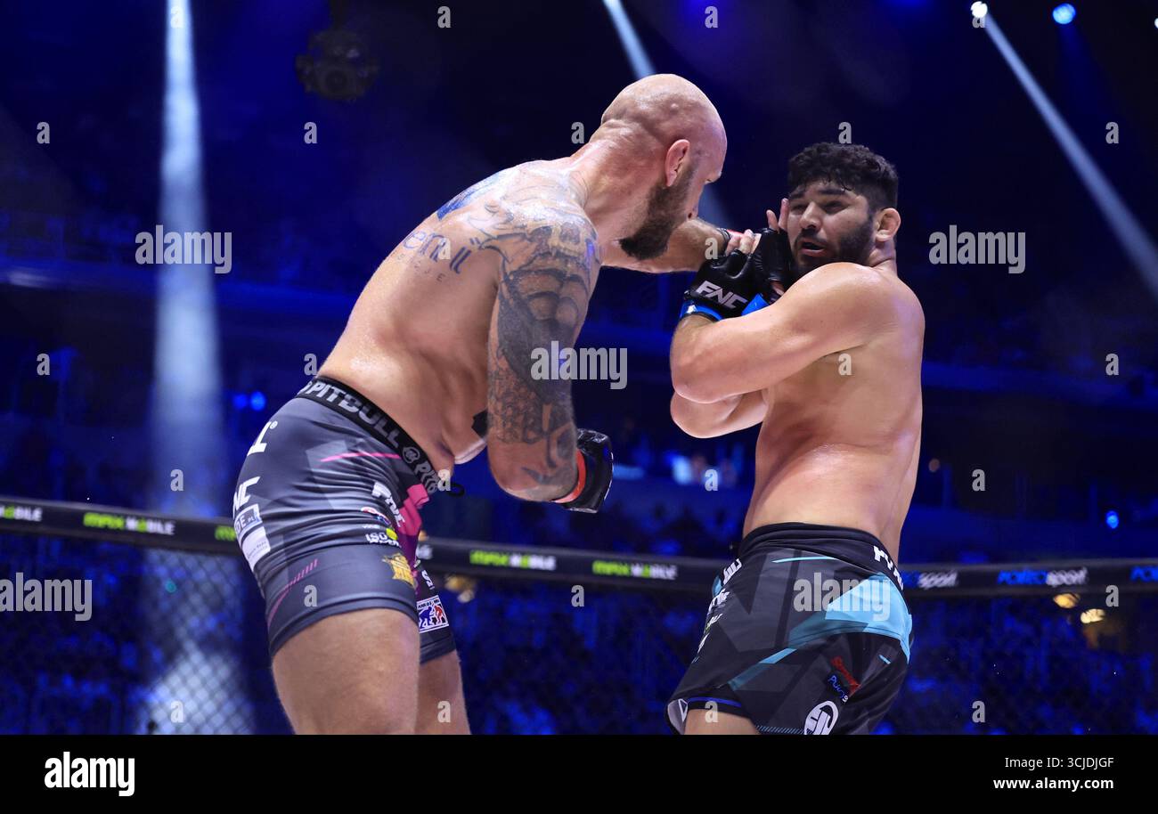 Michal Andryszak of Poland punches Said Sowma of United States in ...
