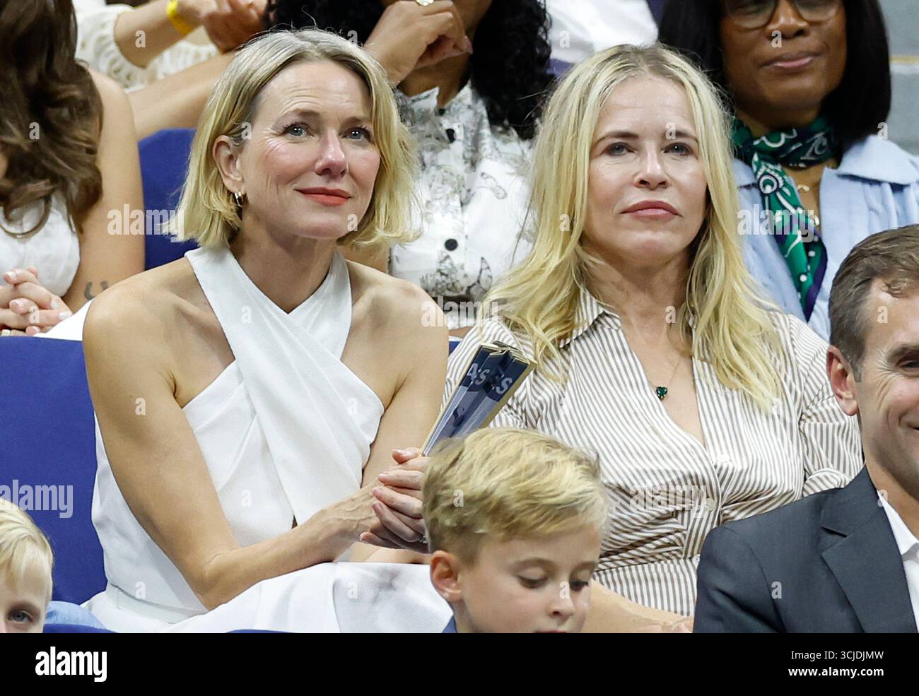 Chelsea Handler (R) and Naomi Watts watch Amanda Anisimova play Aryna Sabalenka of Belarus in ...
