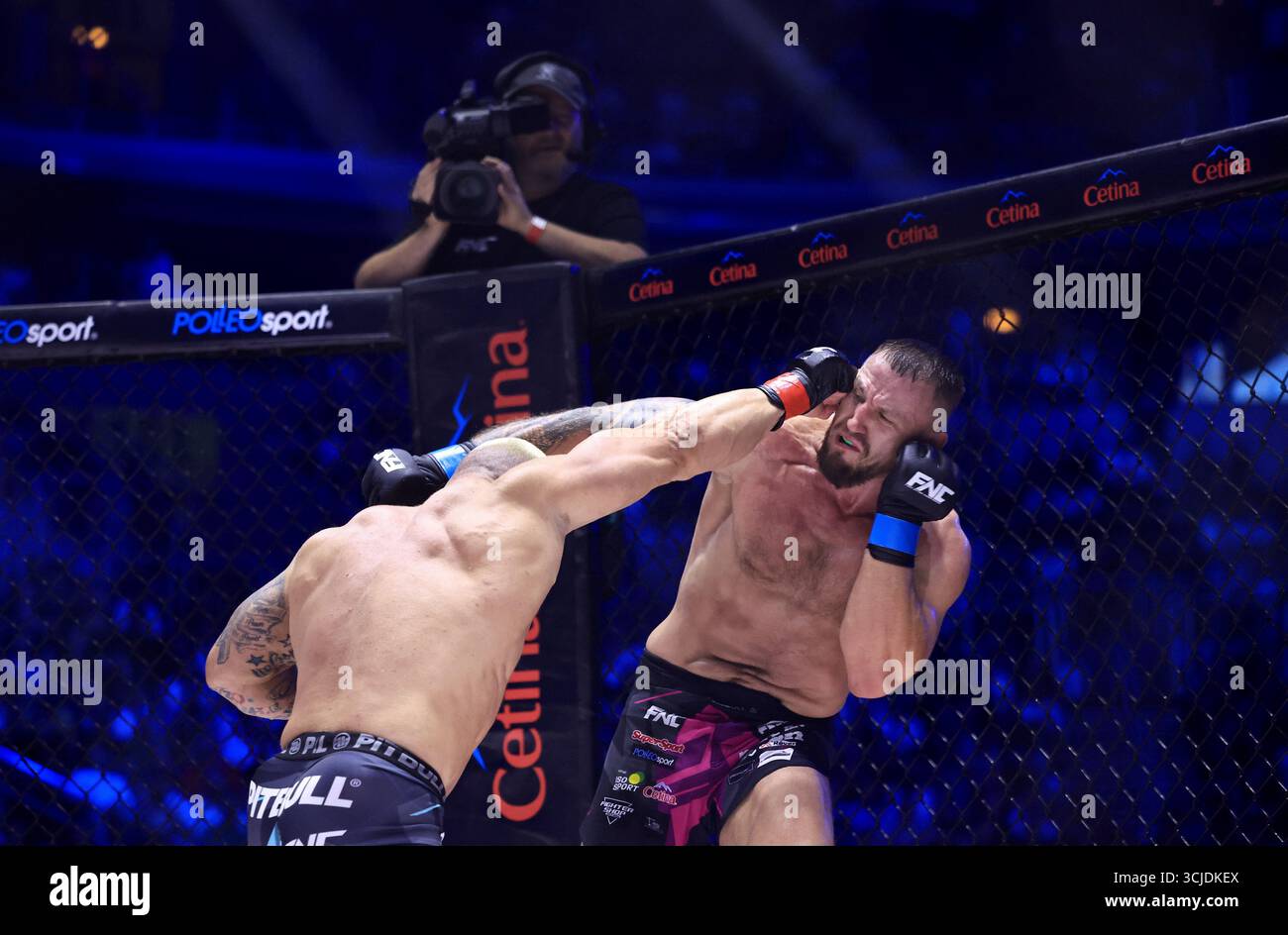 Tomislav Spahovic of Bosnia and Herzegovina punches Arturas Kudresovas ...