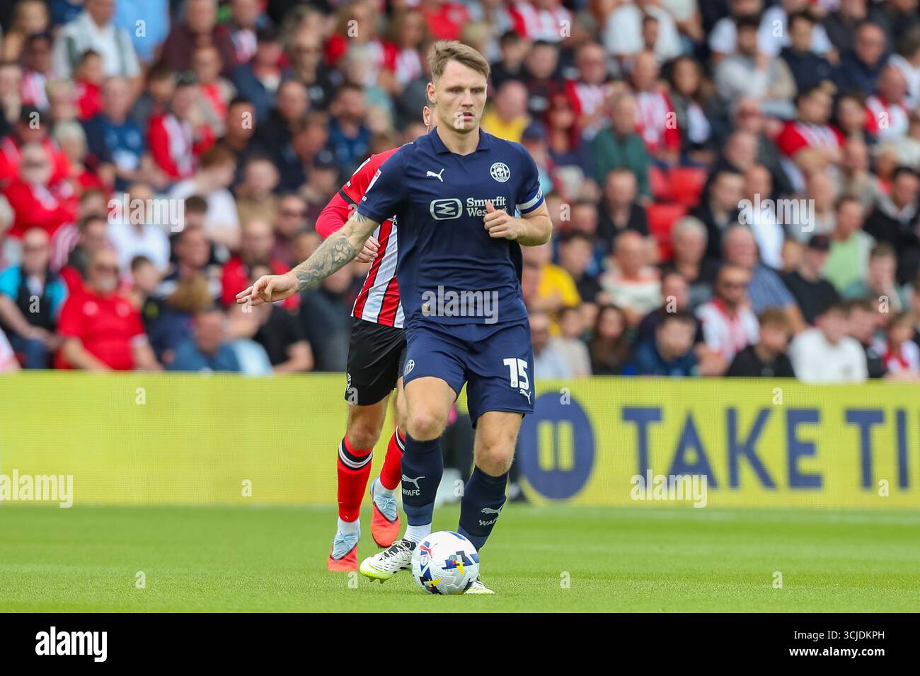 Jason Kerr Of Wigan Athletic in action during the Lincoln City FC v ...