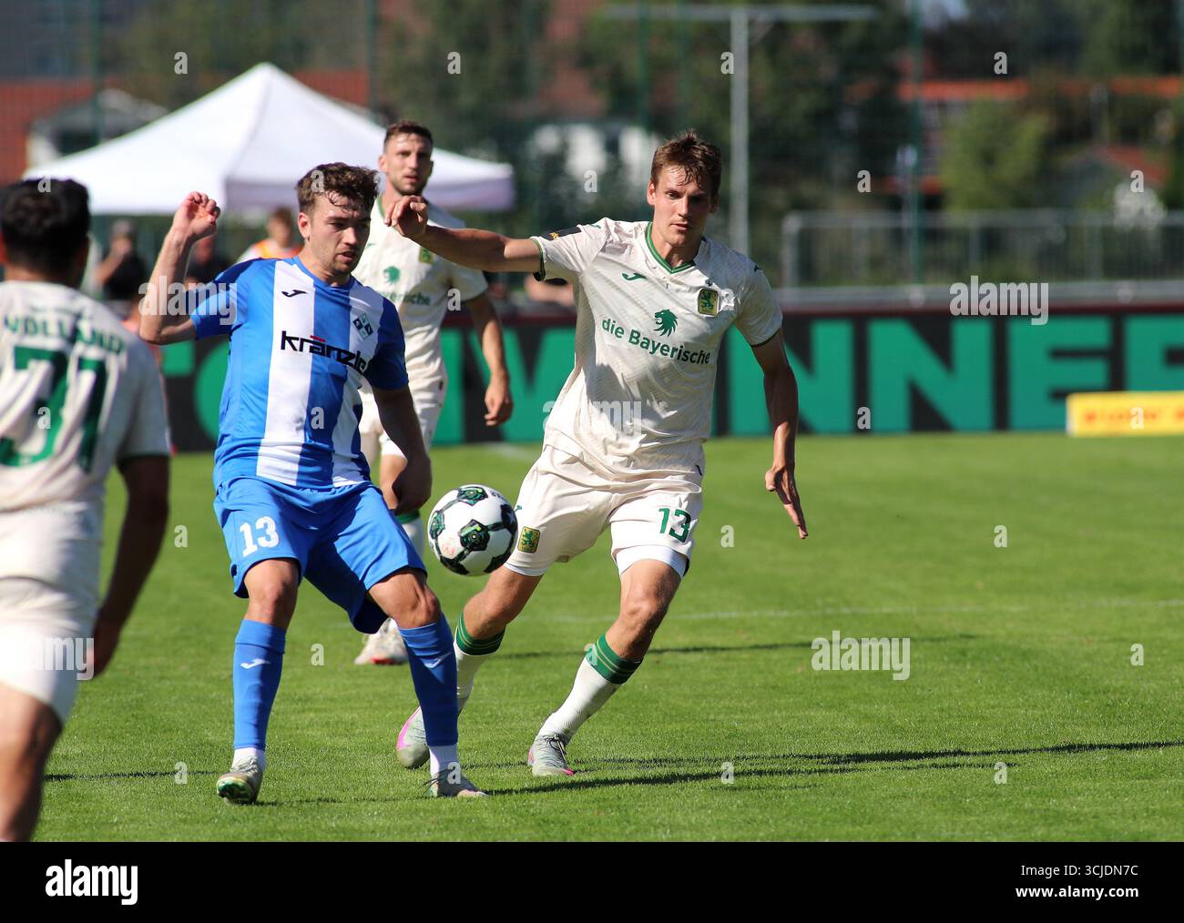 Daniel hausmann fv illertissen li mit max christiansen tsv hi-res stock photography and images ...