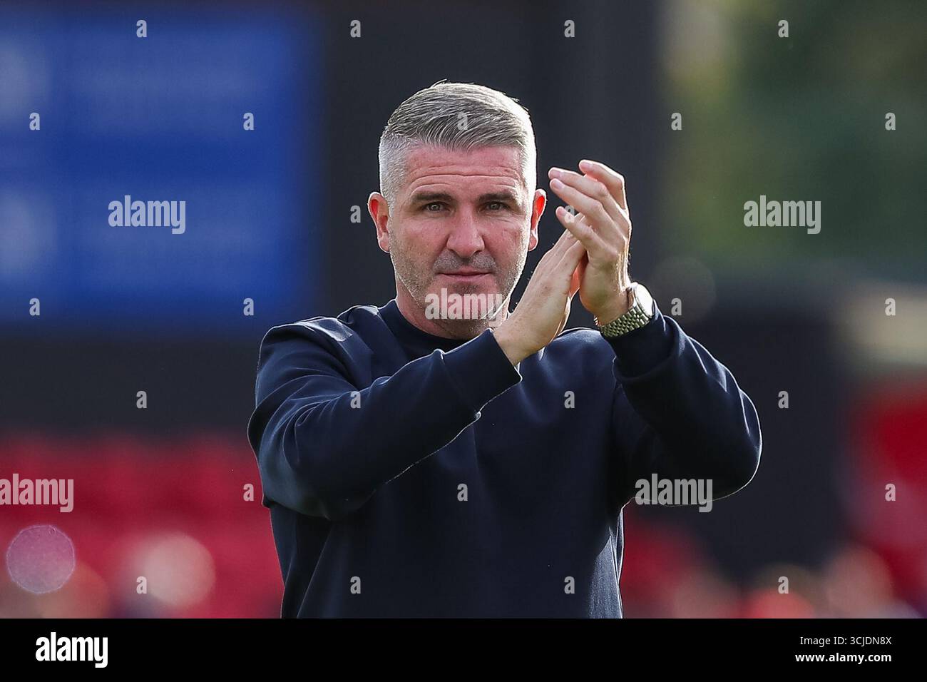 Wigan Athletic Manager Ryan Lowe applauds the fans during the Lincoln ...