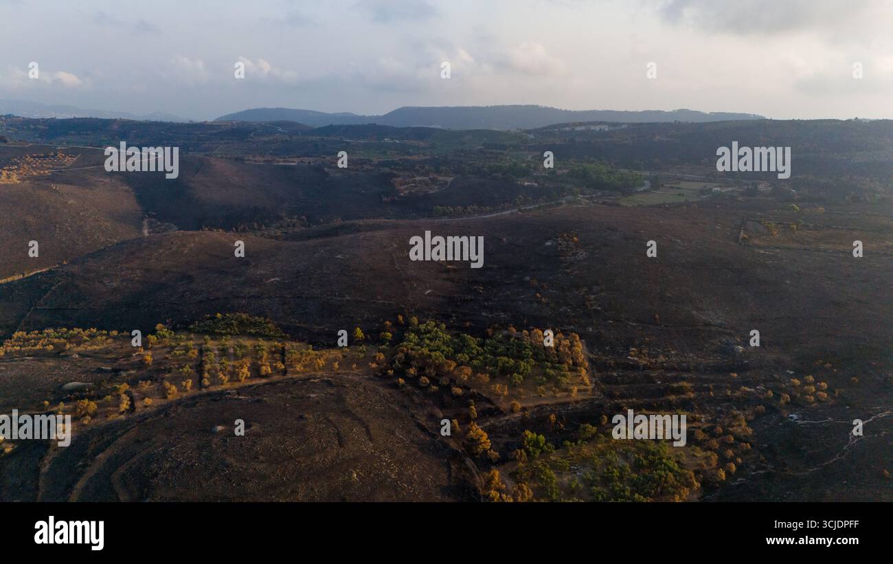 Aerial view of Zakynthos burned hills after 2025 wildfires with ...