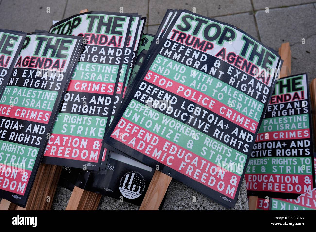 Signs are seen as people prepare for Illinois Coalition for Immigrant ...