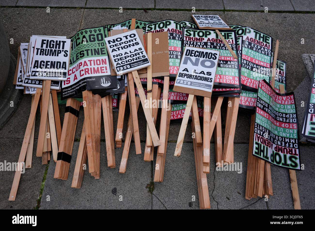 Signs are seen as people prepare for Illinois Coalition for Immigrant ...