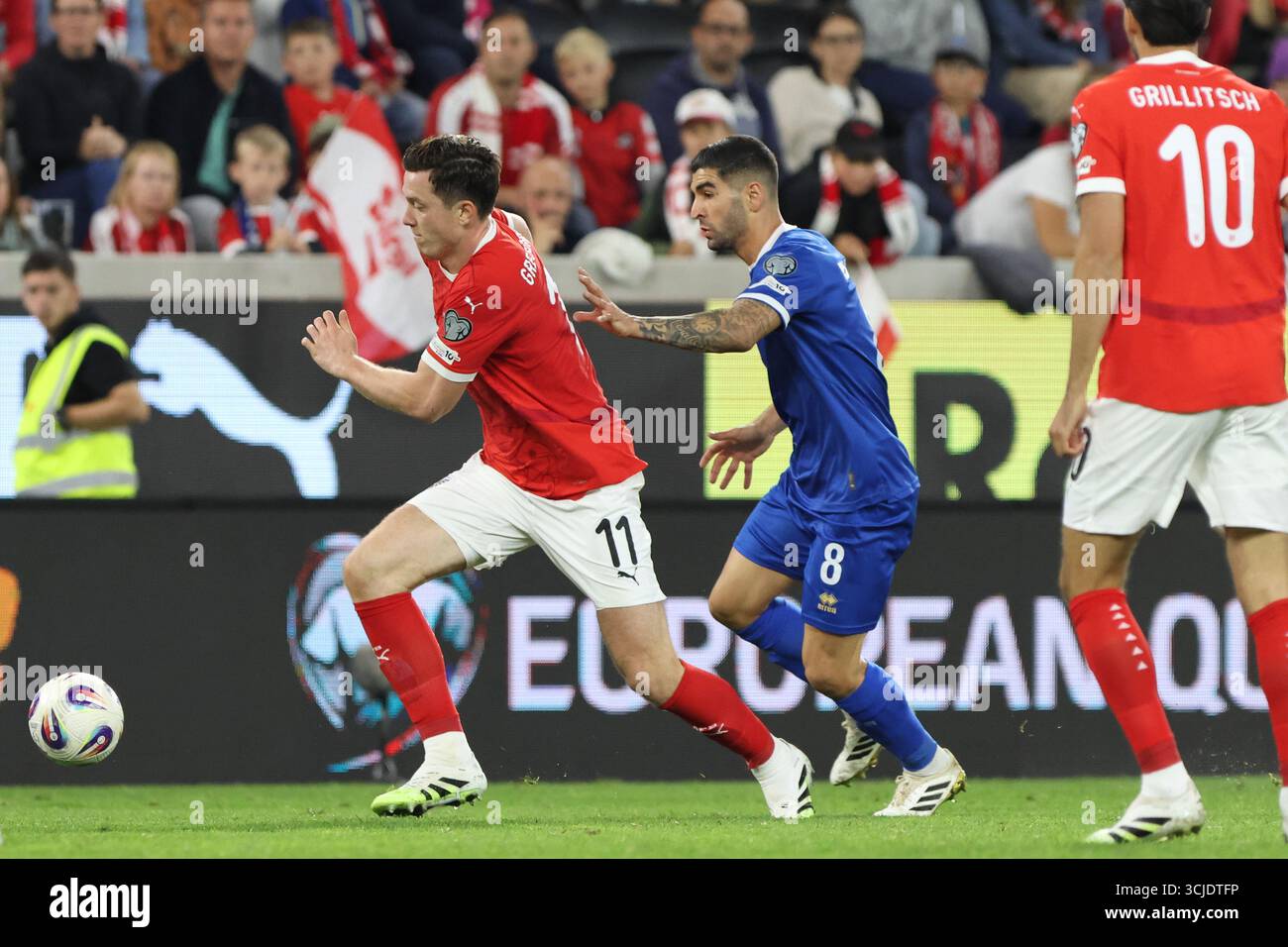 LINZ, AUSTRIA - SEPTEMBER 6: Michael Gregoritsch of Austria and Ioannis ...