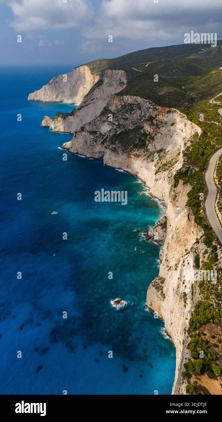 Aerial view of Zakynthos Greece dramatic coastal road curving by steep ...