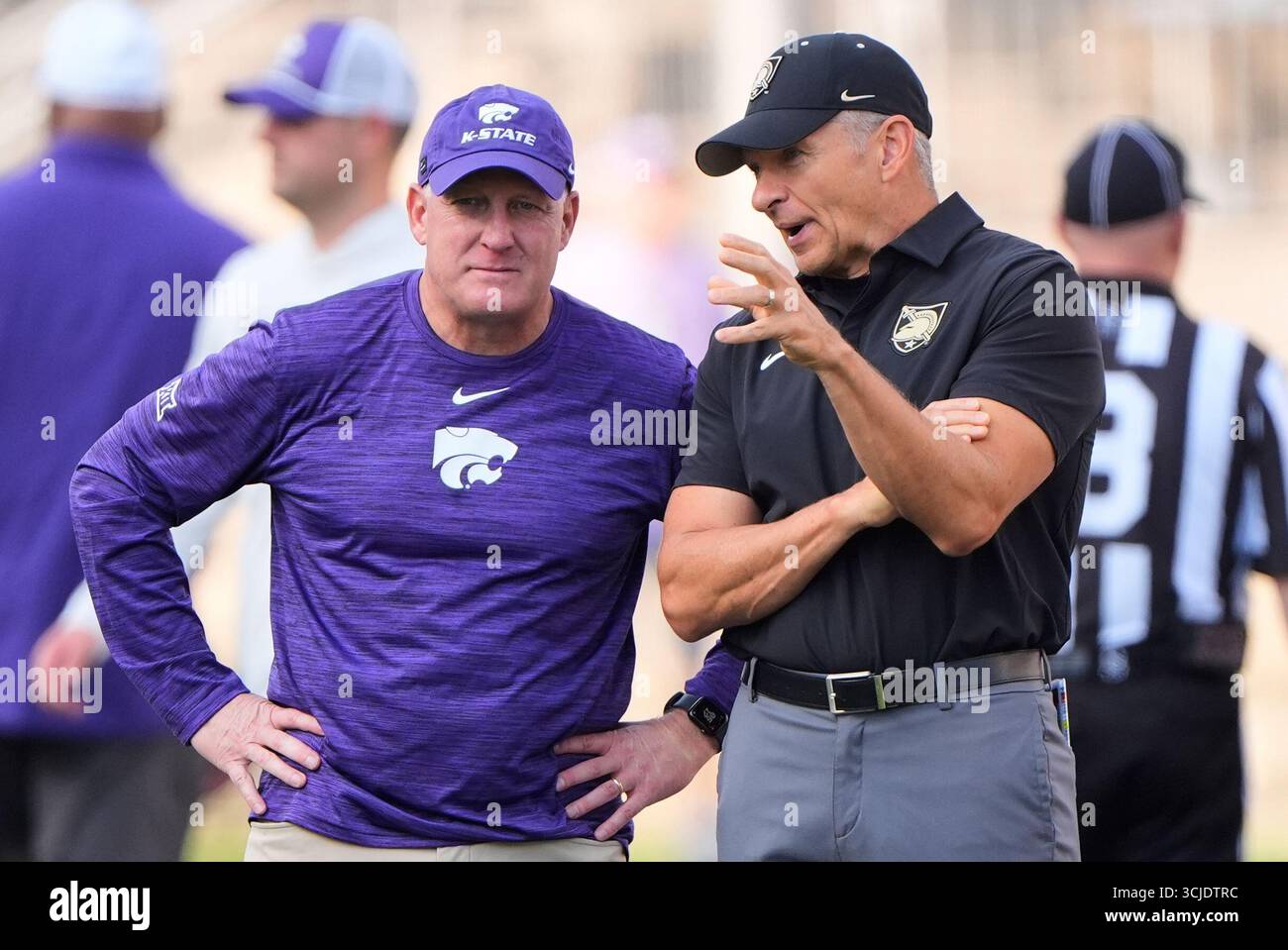 Kansas State head coach Chris Klieman, left, and Army head coach Jeff ...