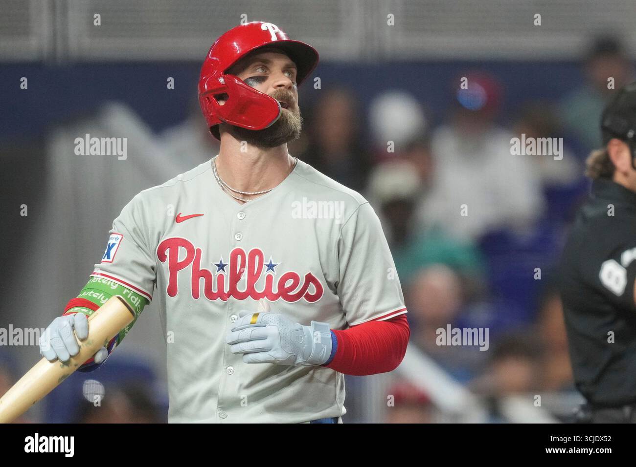 Philadelphia Phillies' J.T. Realmuto reacts after striking out during ...