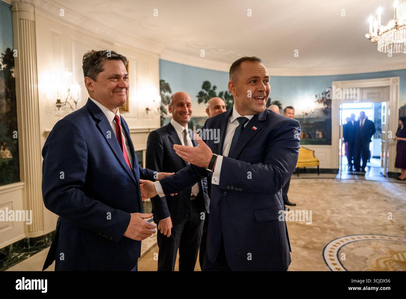 Polish President Karol Nawrocki hugs Director of Domestic Policy ...