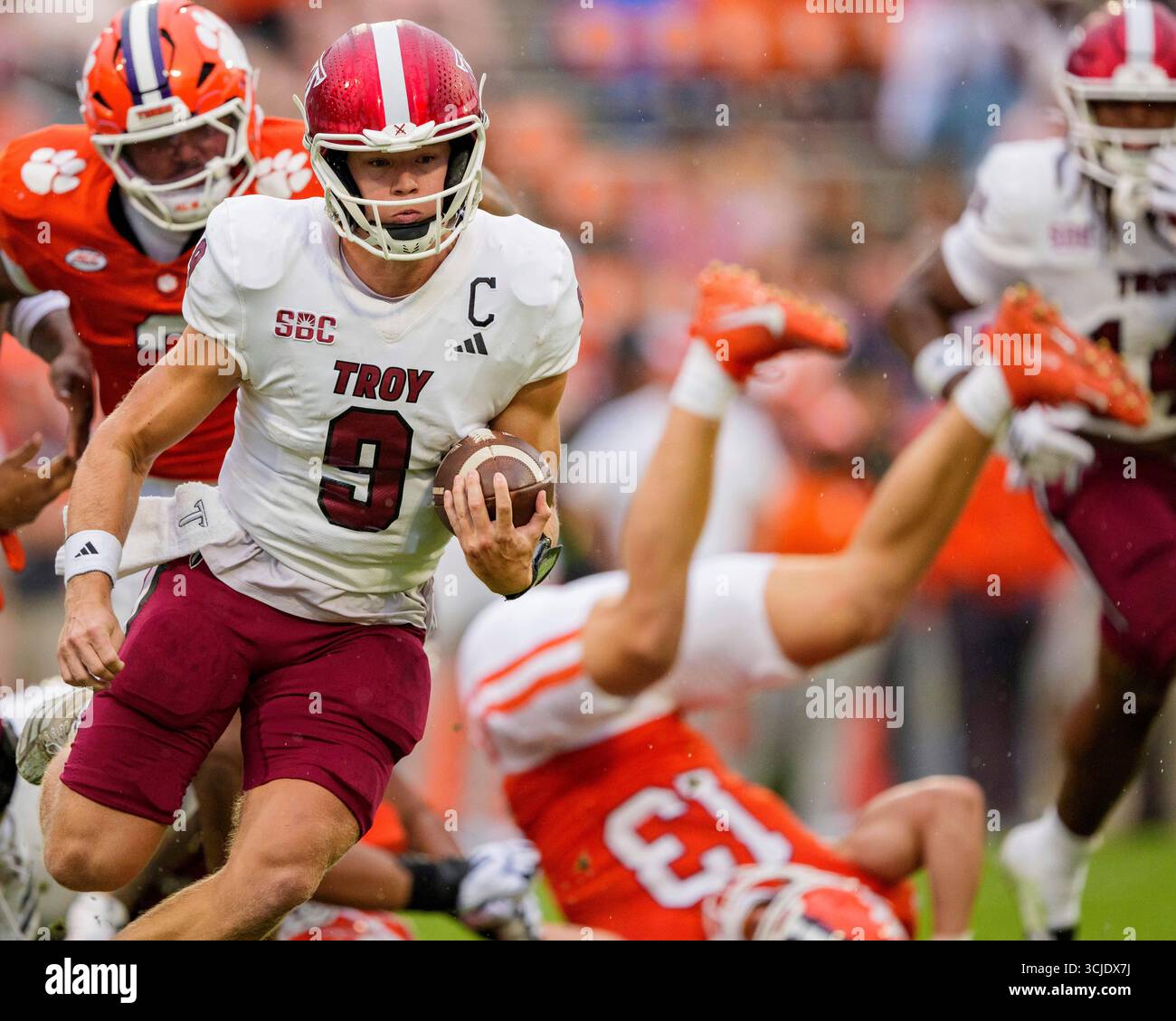 Troy quarterback Goose Crowder (9) runs with the ball in the first half ...