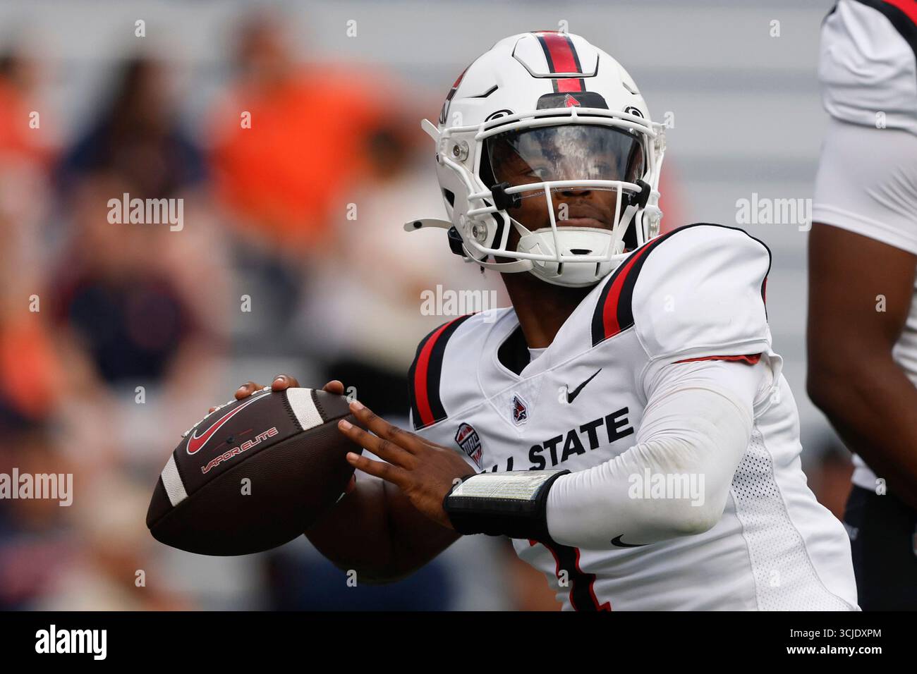 Ball State quarterback Kiael Kelly warms up before an NCAA college ...