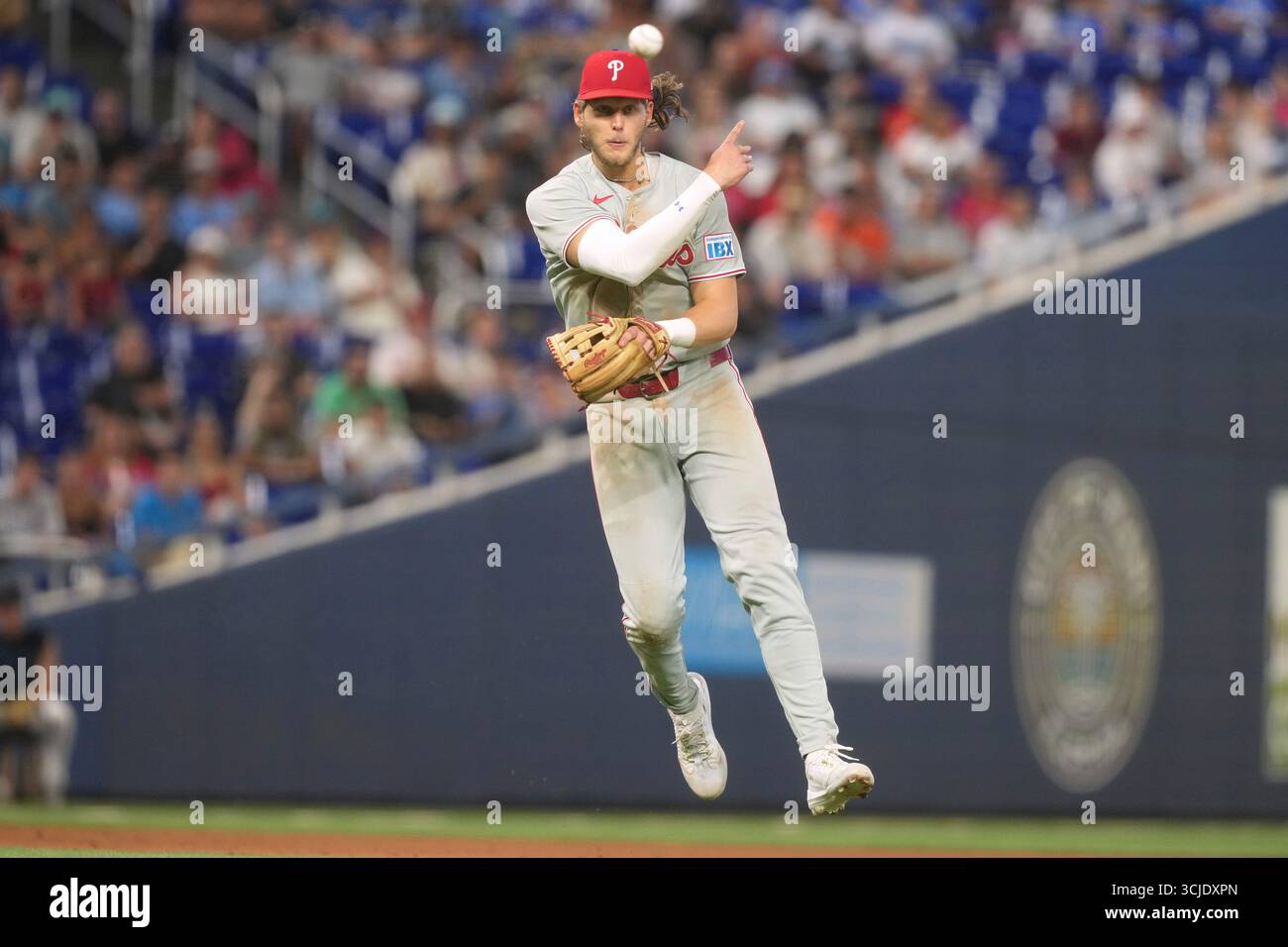 Philadelphia Phillies third baseman Alec Bohm throws to first base ...